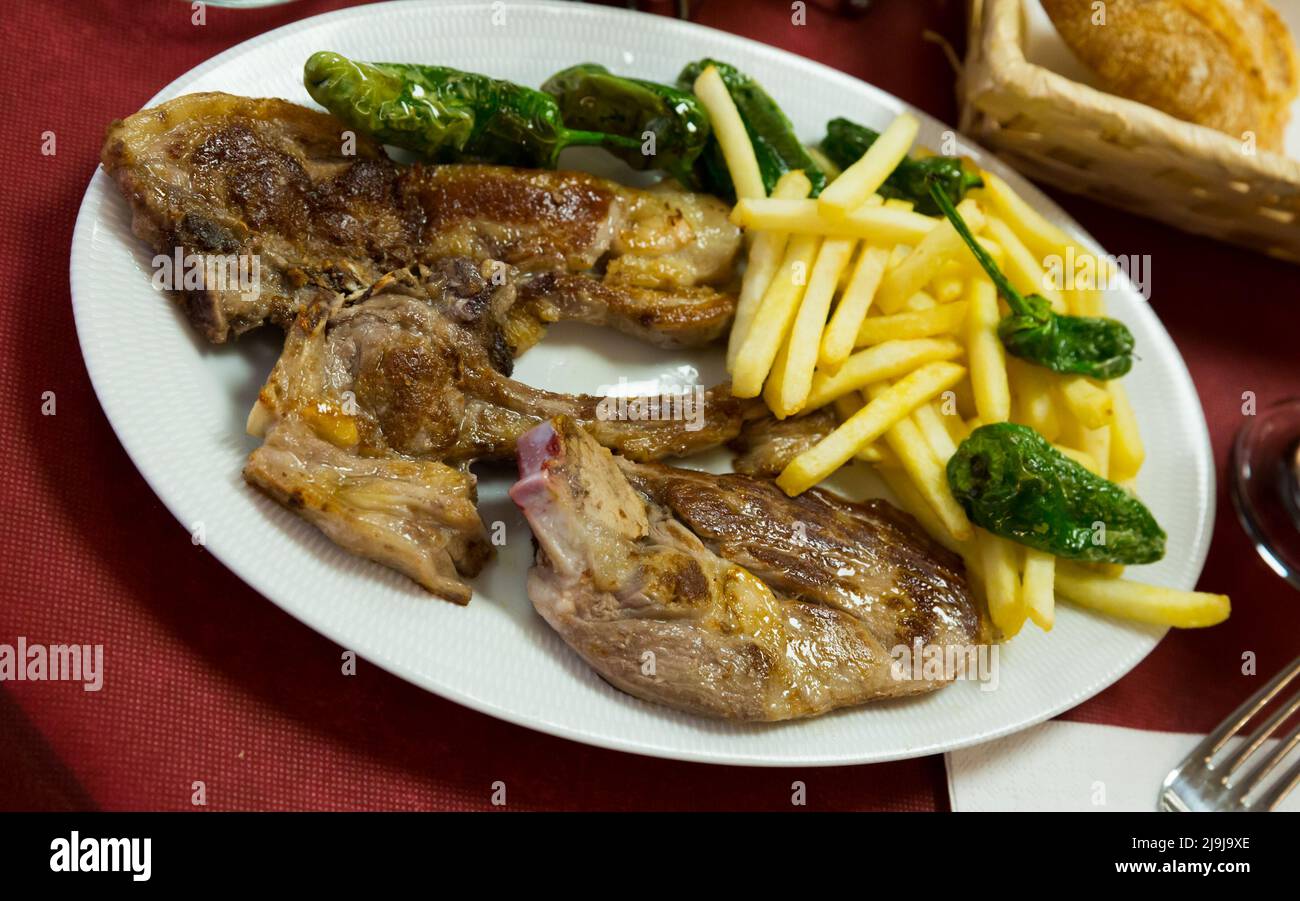 Roasted lamb with sauce alioli Stock Photo - Alamy