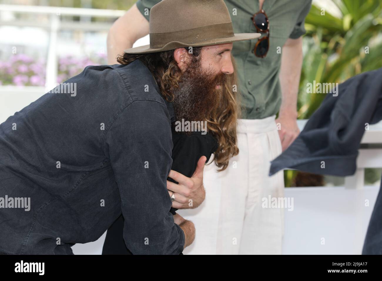 May 21, 2022, Cannes, Cote d'Azur, France: THOMAS M. WRIGHT hugs his ...
