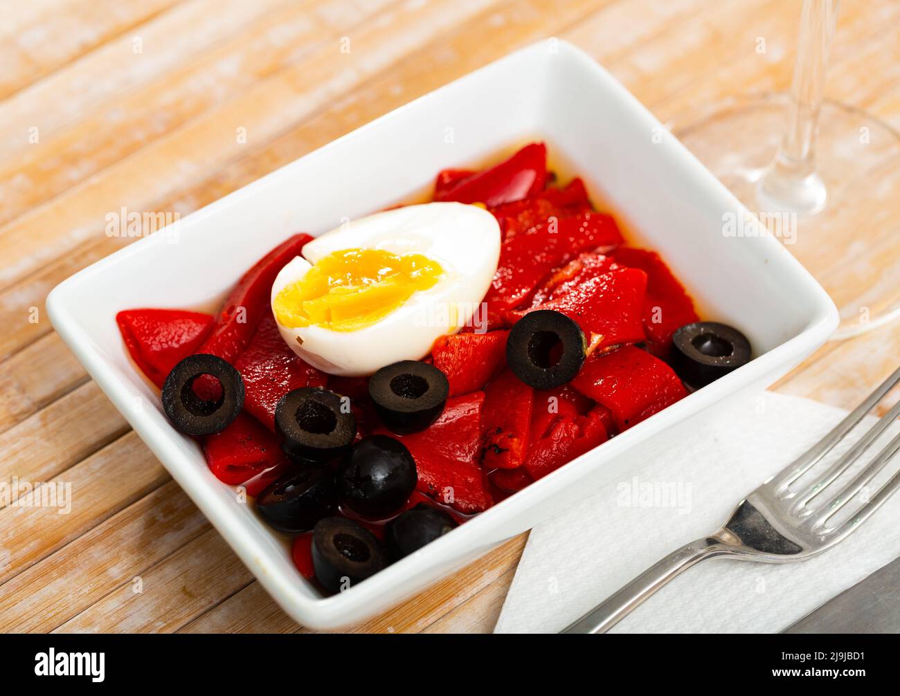 Stewed sweet red peppers with boiled egg Stock Photo - Alamy