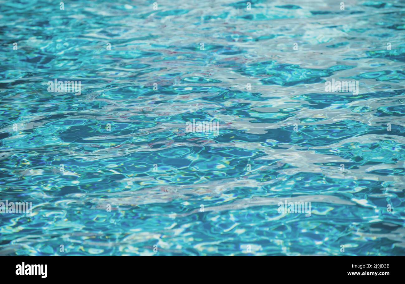 Abstract ripple wave and clear turquoise water surface in swimming pool ...