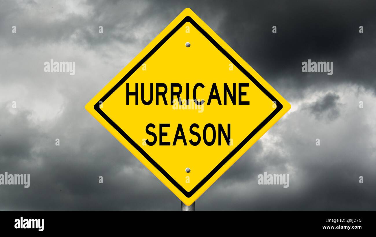 Yellow warning sign for hurricane Stock Photo - Alamy