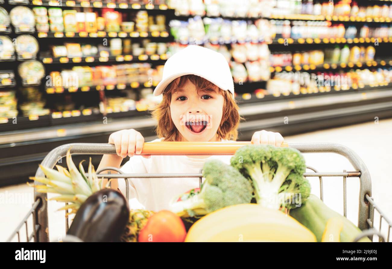 Sale, consumerism and people concept - excited kids with food in ...