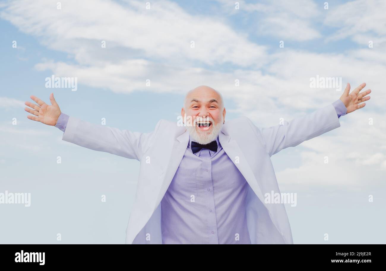 Life winner concept. Old mature man. Vintage success male in white suit ...
