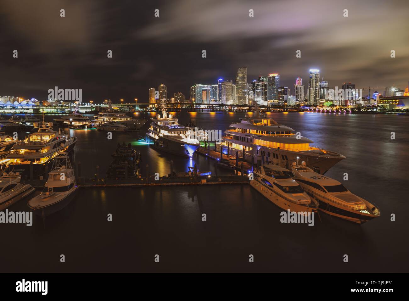 Miami night. Port Miami Florida. Yacht or boat next to Miami dow Stock ...