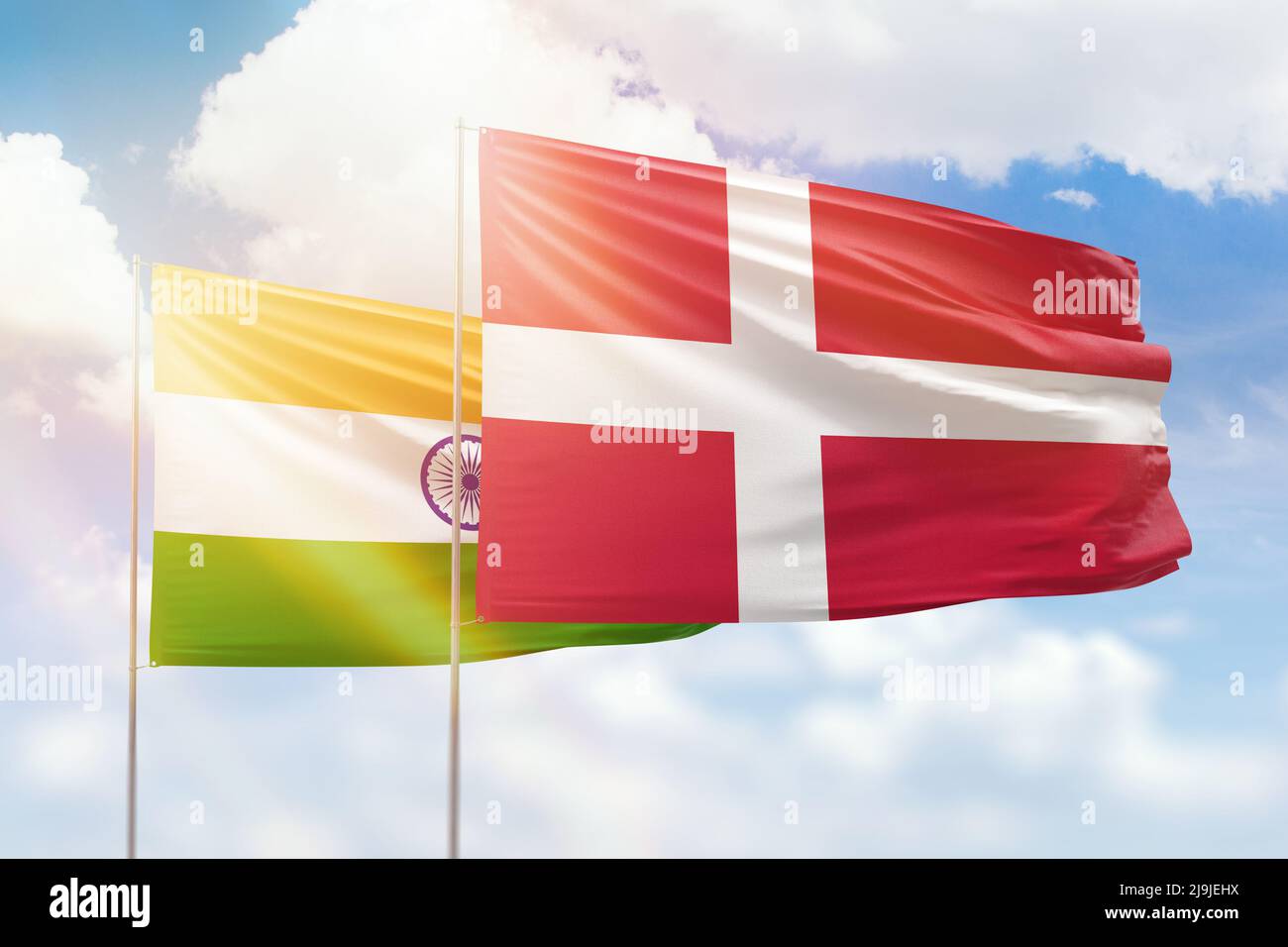 Sunny blue sky and flags of denmark and india Stock Photo - Alamy
