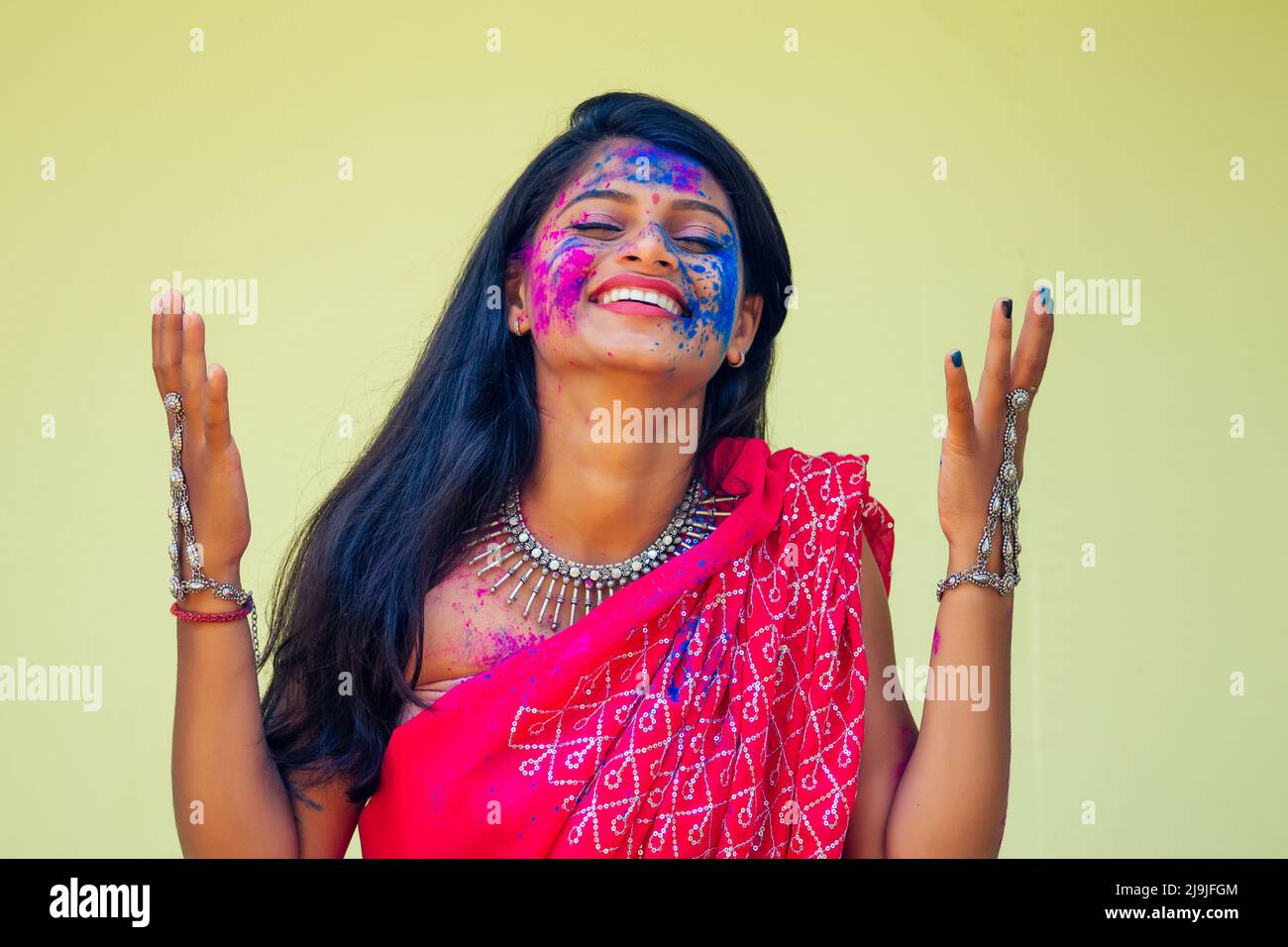 Holi Festival Of Colours. Portrait of happy indian girl in traditional ...