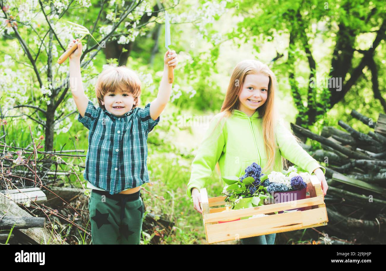 Kids working in volunteer group. Childhood on countryside. Children ...