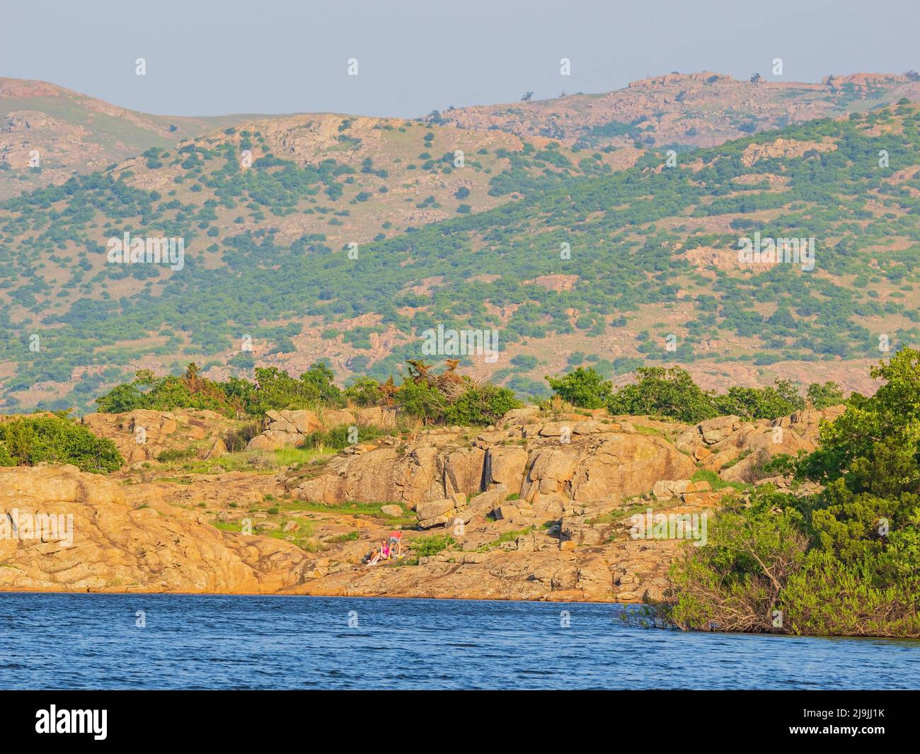 Sunny view of the landscape around Wichita Mountains Wildlife Refuge at ...
