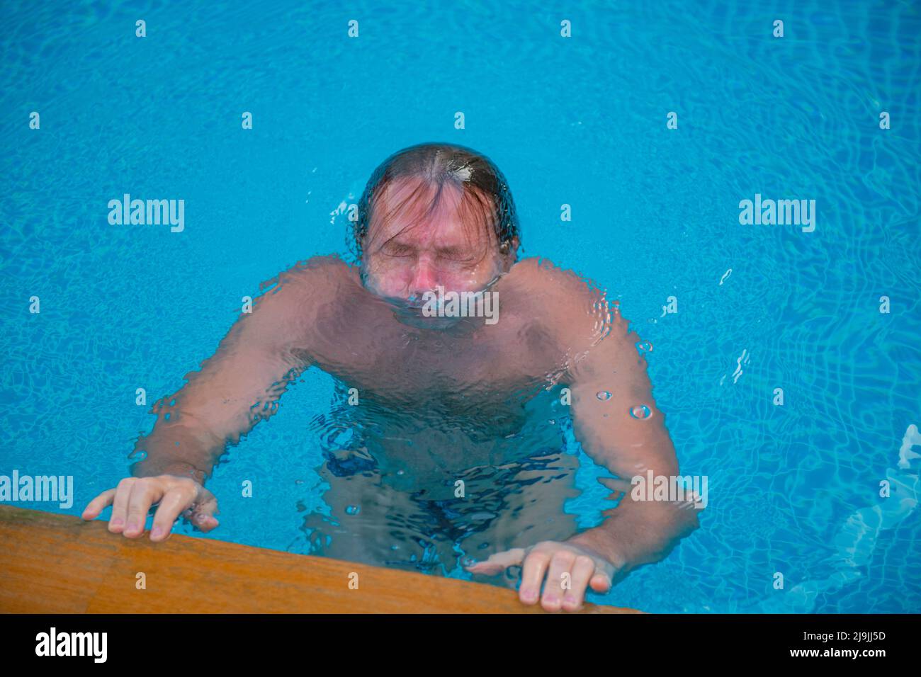 a man dived in a deep pool Stock Photo - Alamy