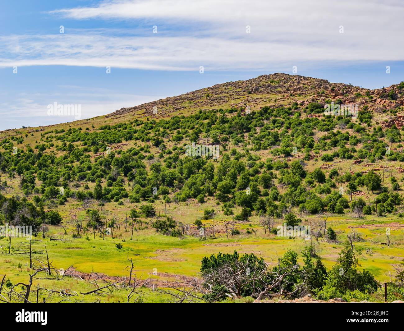 Sunny view of the landscape around Wichita Mountains Wildlife Refuge at ...