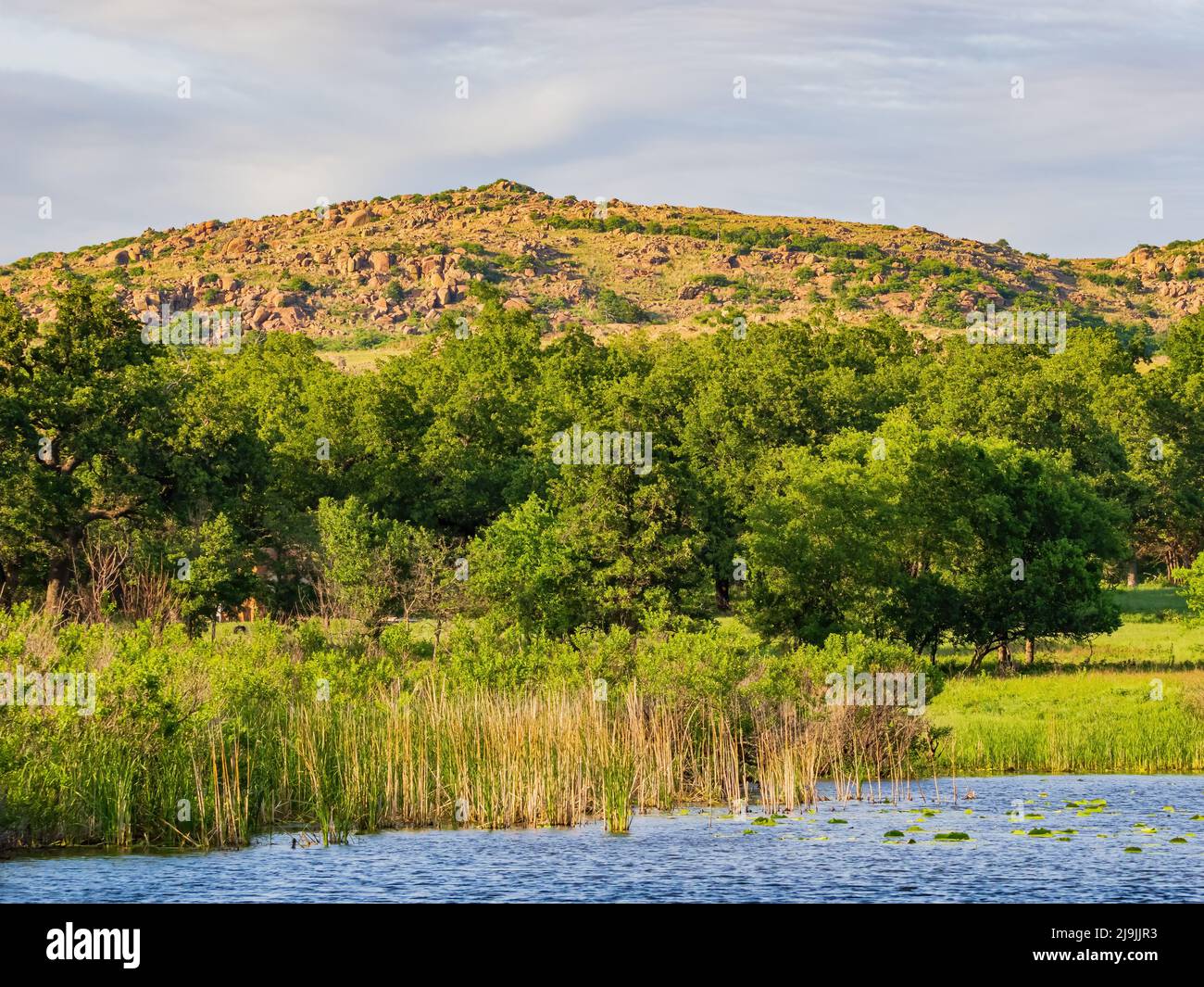Sunny view of the landscape around Wichita Mountains Wildlife Refuge at ...