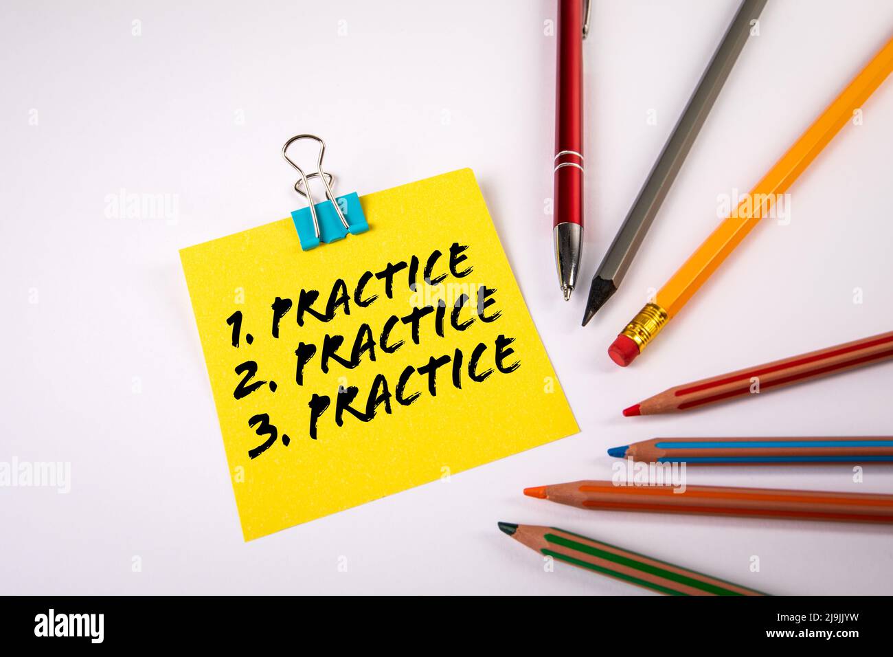 PRACTICE. Sheet of paper with text on a white office desk Stock Photo ...