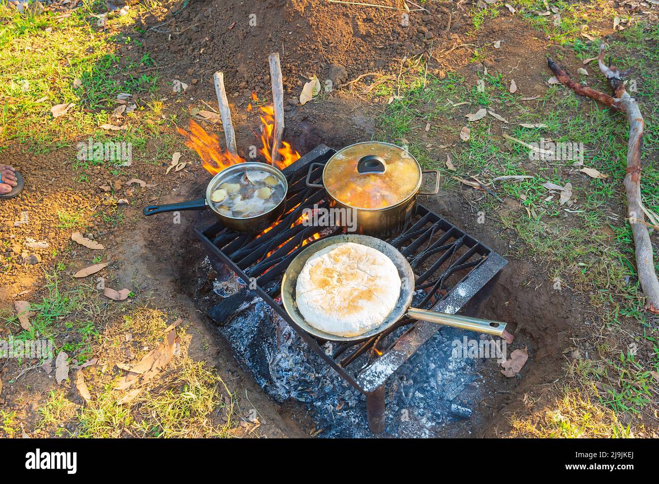 Meal cooking on a fire during the Taste of Kakadu Festival, Cooinda ...