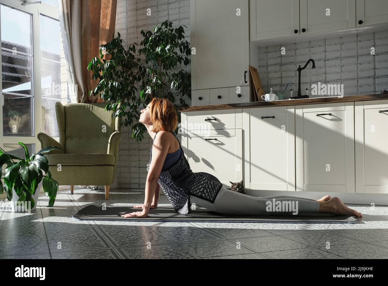 Middle aged woman practicing meditation at home, calm senior middle ...