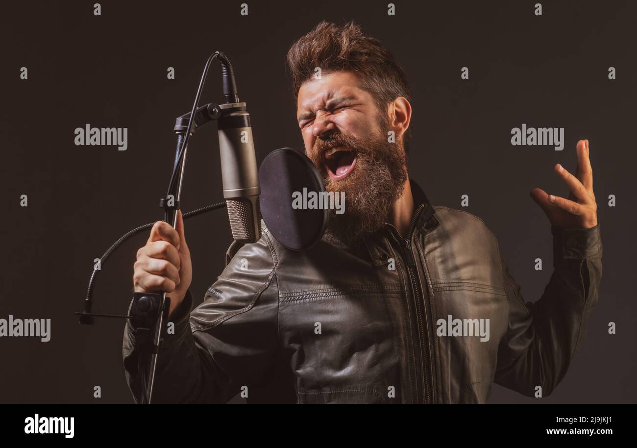 Bearded man singing microphone hi-res stock photography and images - Alamy