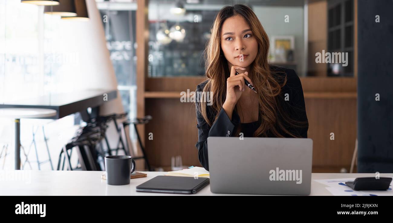 Portrait of Frustrated Business woman have problem while sitting at her ...