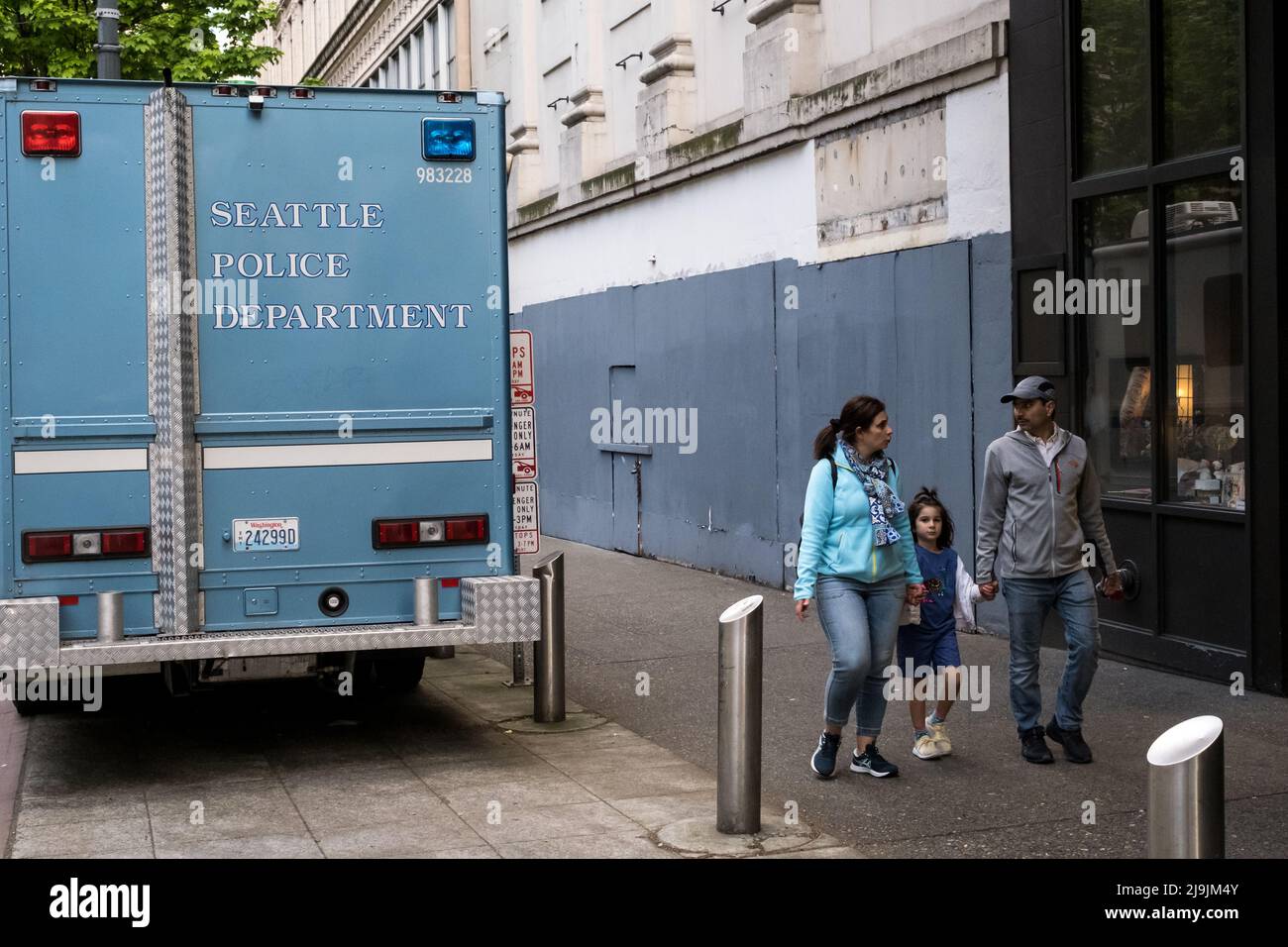 Seattle, USA. 23nd May, 2022. A family passing the Seattle Police ...