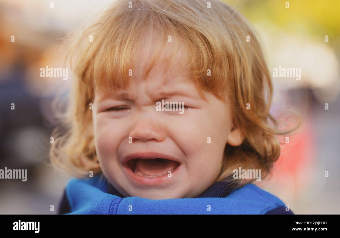Baby cry. Close up portrait of a crying kid Stock Photo - Alamy