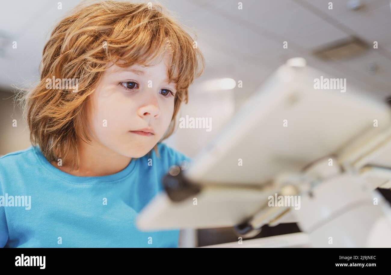 Gadget store. Electronics shopping center. Kid in computer shop ...