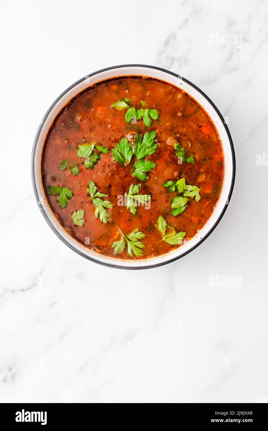 vegan mexican-inspired spicy tomato soup with red kidney beans corn and ...