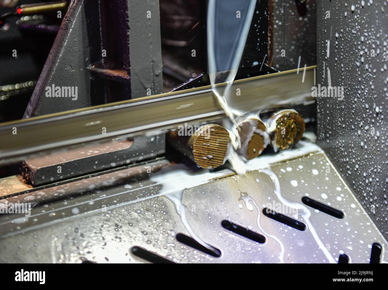 Industrial metal working cutting process The raw material bar clamping ...