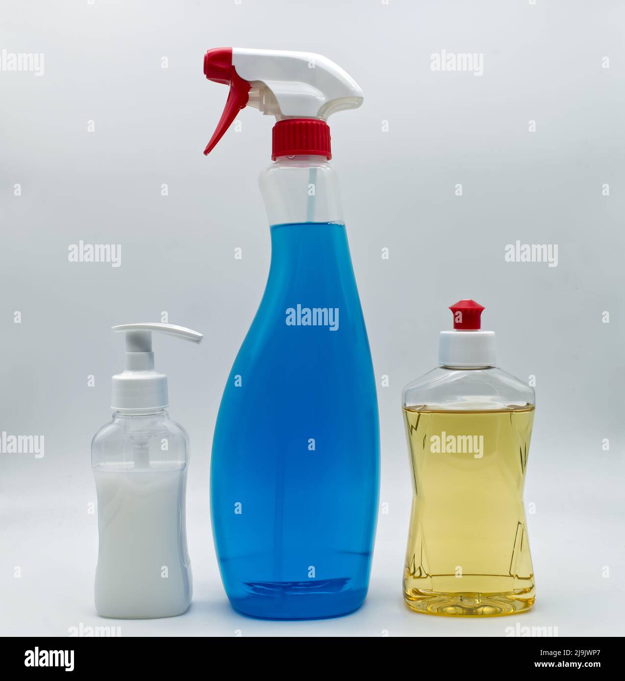 Transparent plastic bottles with dispenser. Full containers isolated on ...