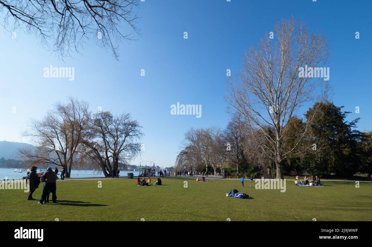 Zurich, Switzerland - March 5th 2022: People relaxing in a park at the ...