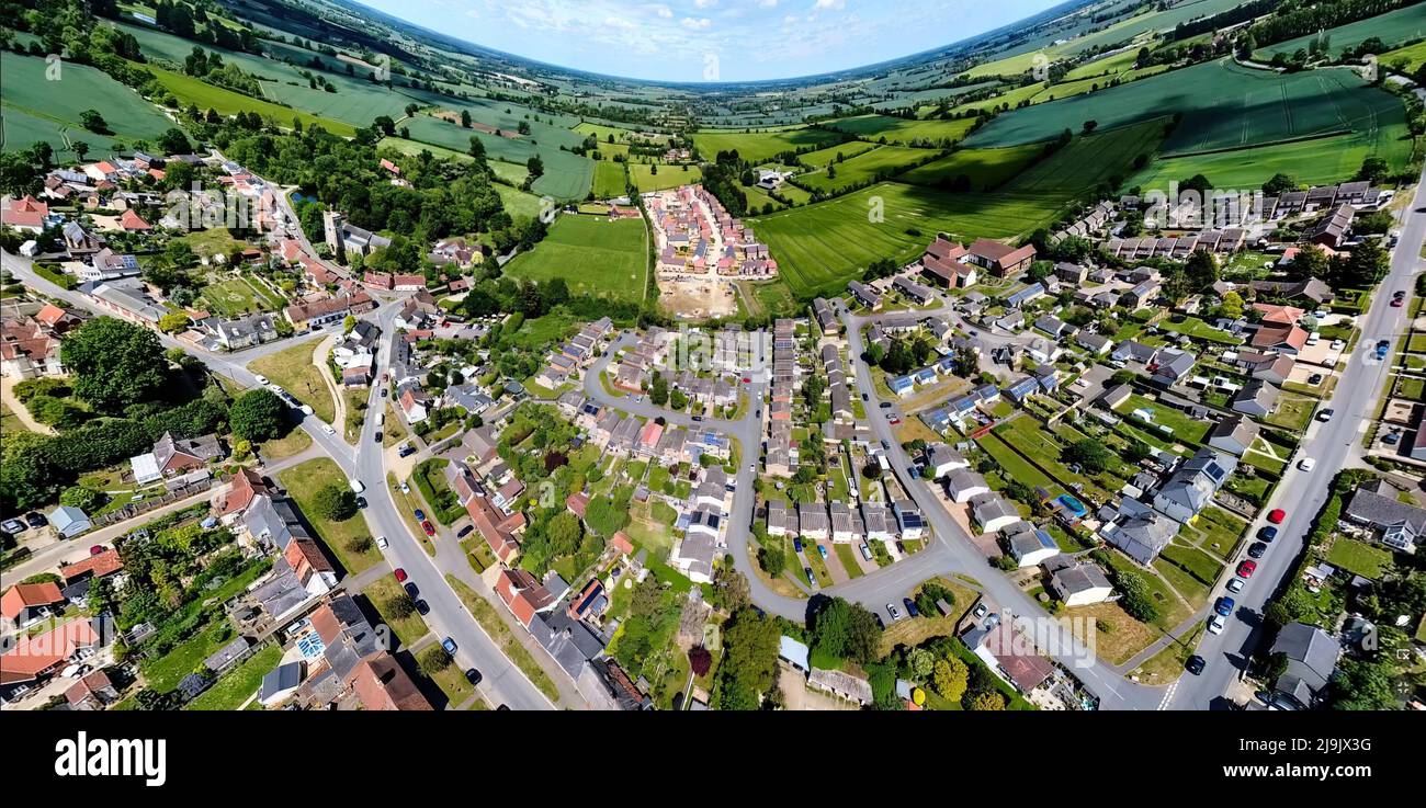 An aerial panoramic view of the village of Haughley in Suffolk, UK ...