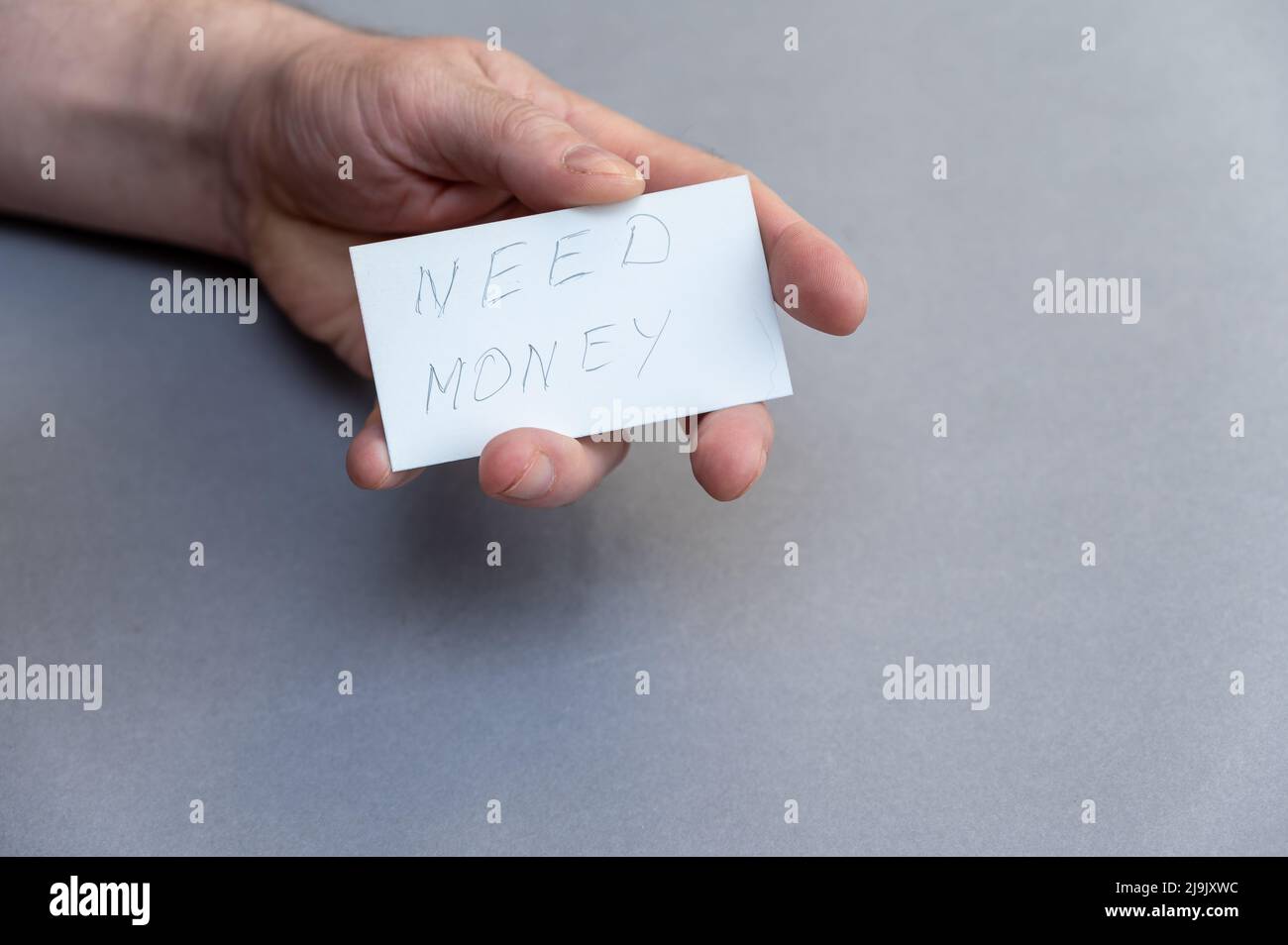 Need Money. Handwritten gray lettering. Open male palm with white ...