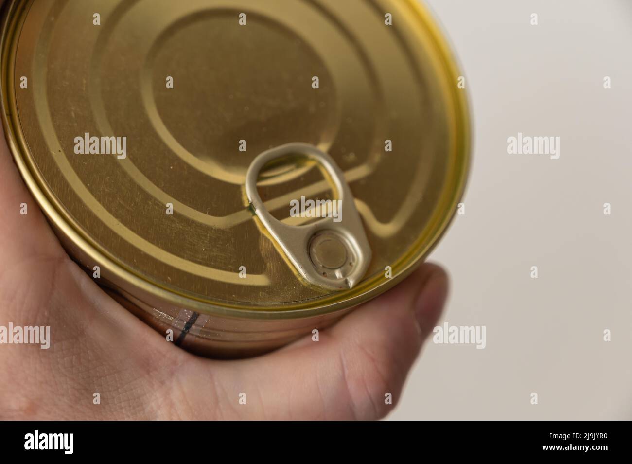 Man eating canned food hi-res stock photography and images - Alamy