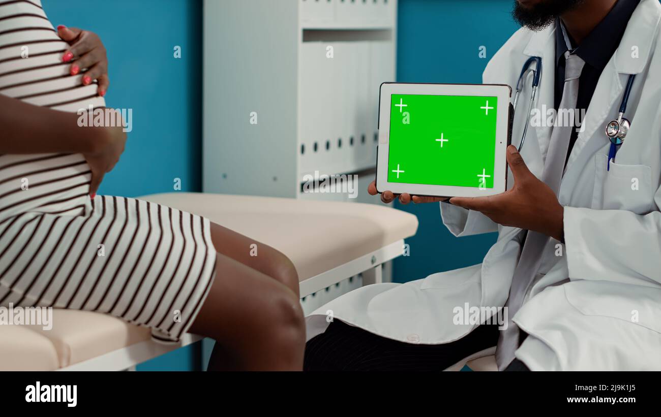 Medical specialist showing horizontal greenscreen hi-res stock ...