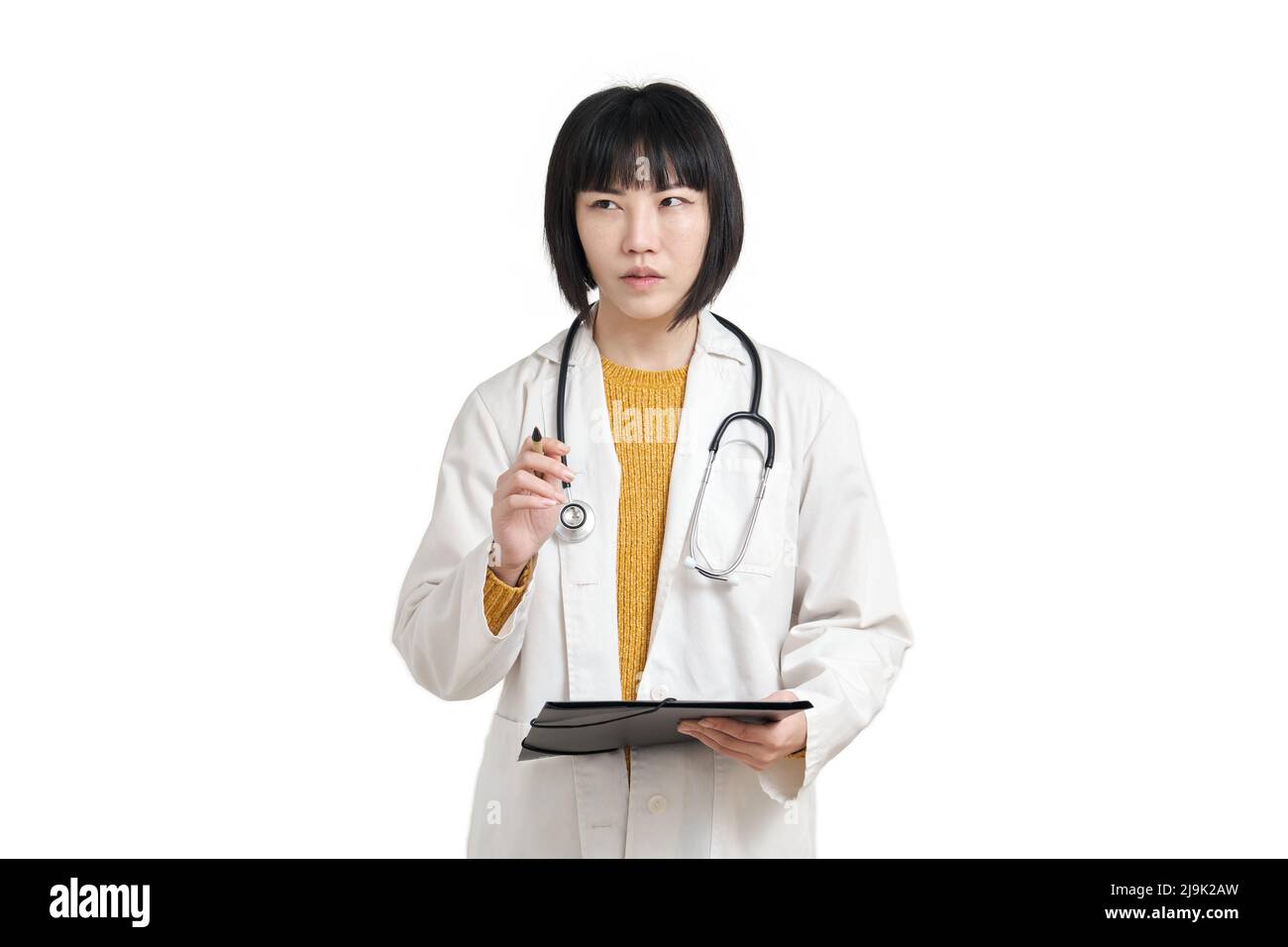 Young asian female doctor thinking with pen and folder, isolated Stock ...