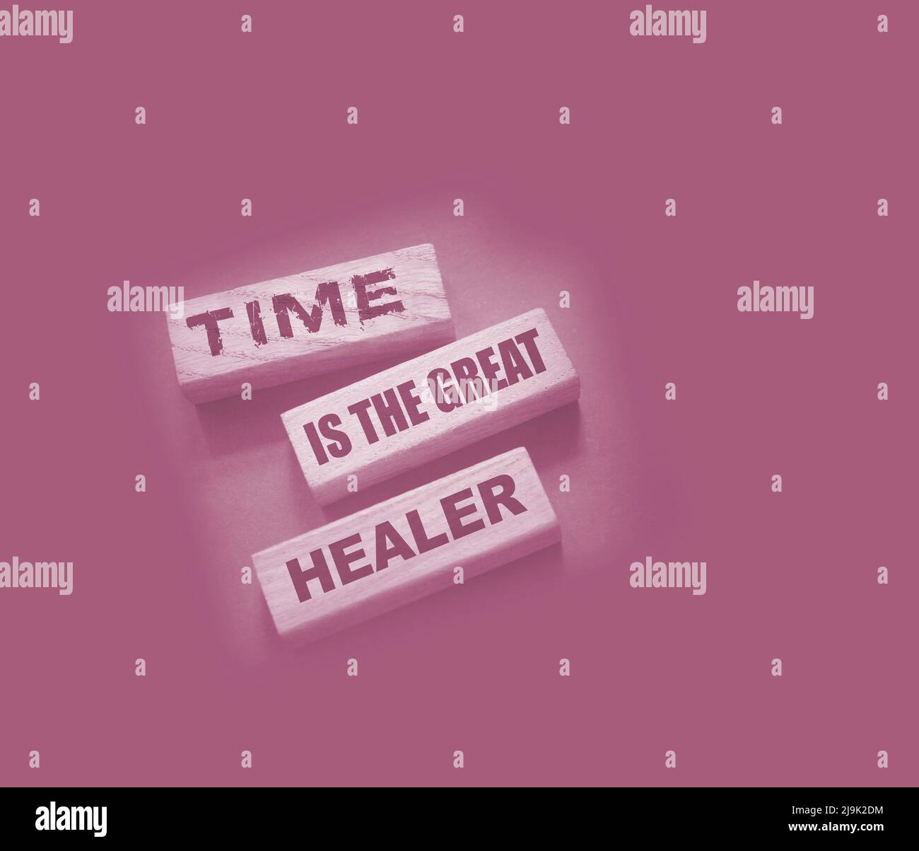 Time is the best healer words on wooden blocks. End of relationship and ...