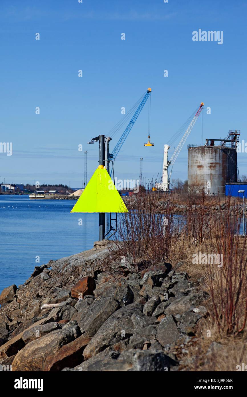 sign with yellow triangle for shipping at port Stock Photo - Alamy