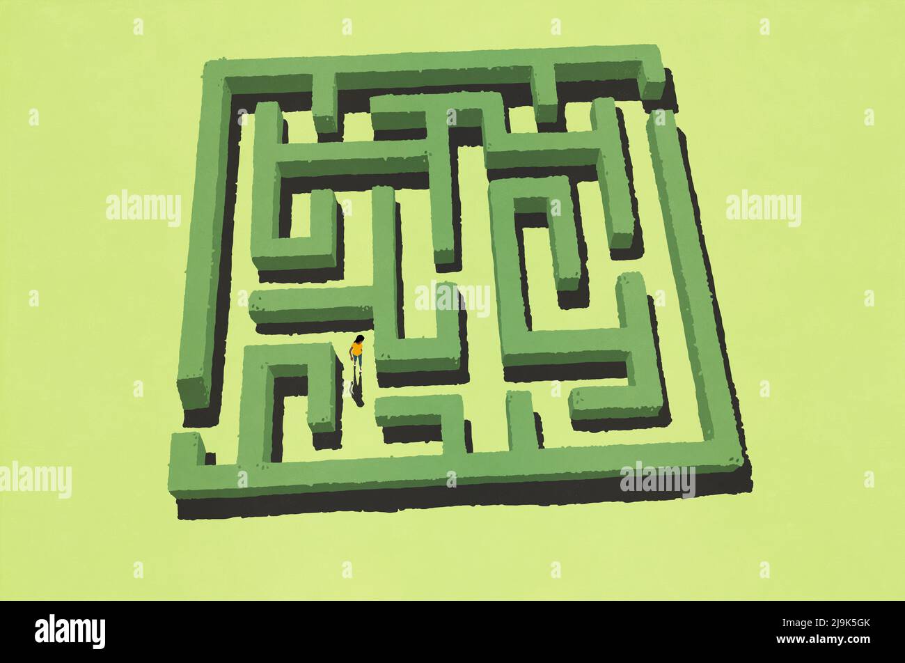 Woman walking in labyrinth Stock Photo - Alamy