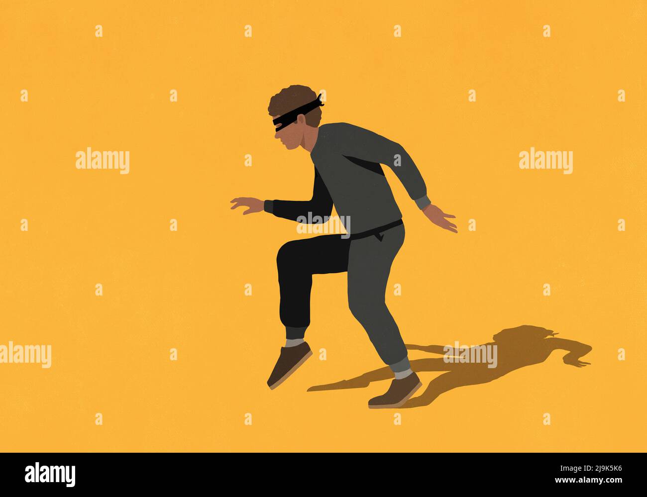 Burglar in mask and shadow creeping Stock Photo - Alamy
