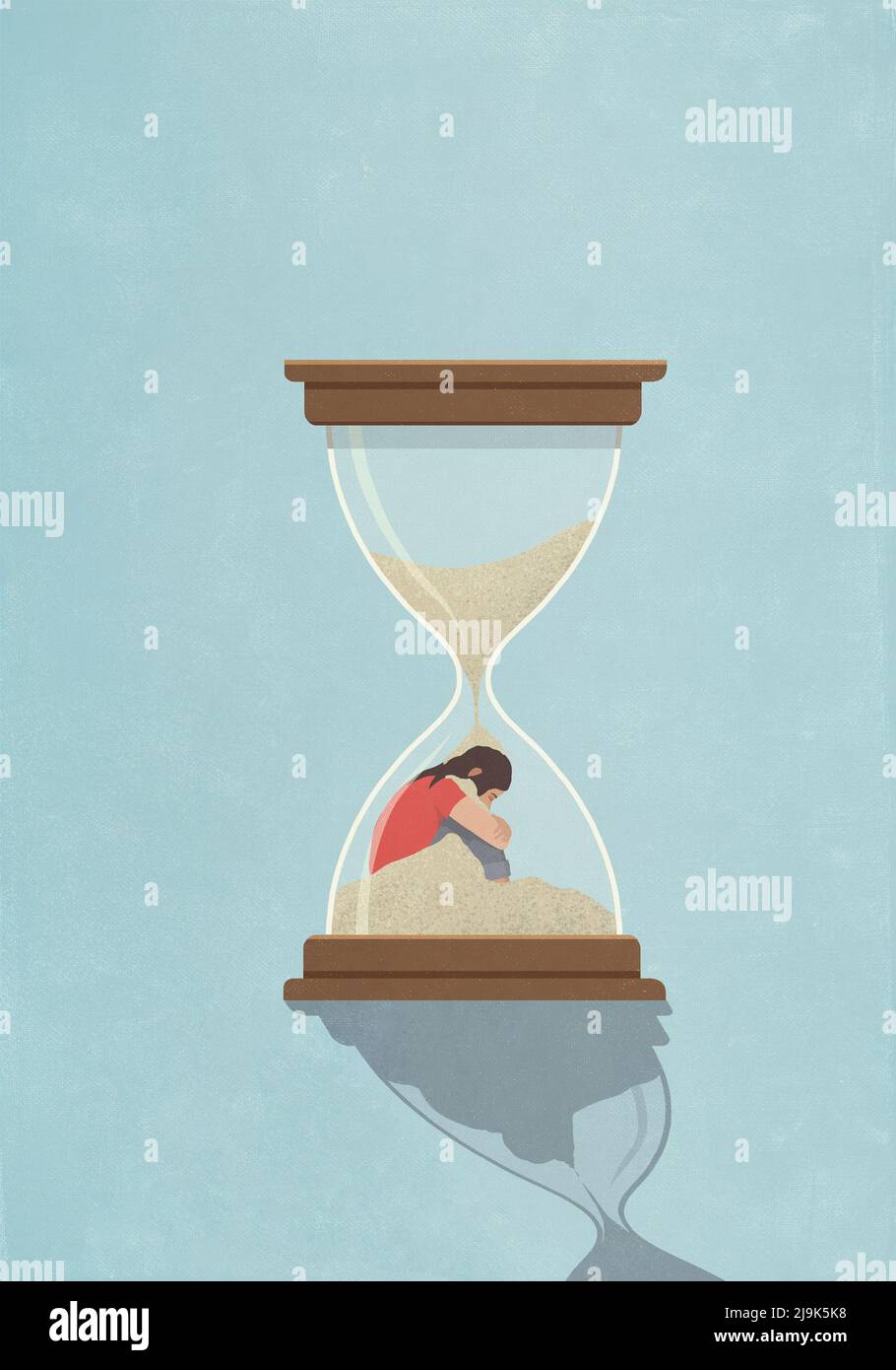 Sand falling over woman inside hourglass Stock Photo - Alamy