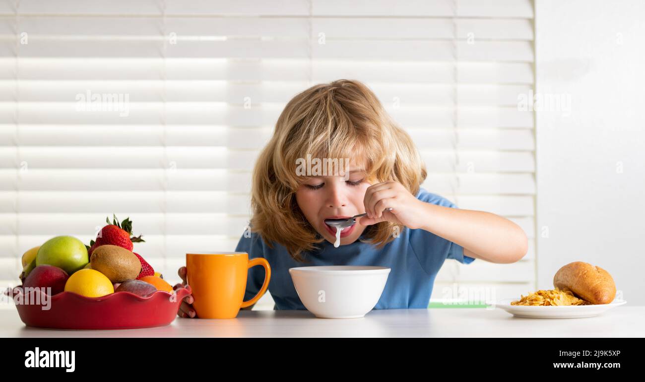 Child eating meal. Healthy nutrition for children. Cute boy enjoy ...