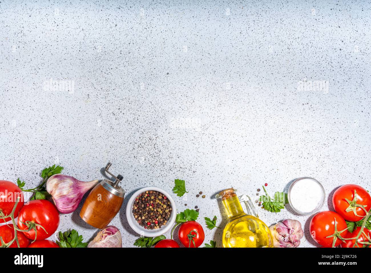 Cooking ingredients background. Spices, black pepper, garlic, onion ...