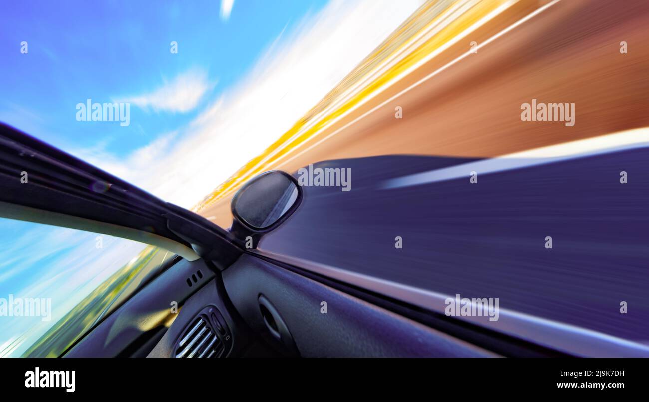 Car driving fast on the countryside asphalt road. Car and travel ...