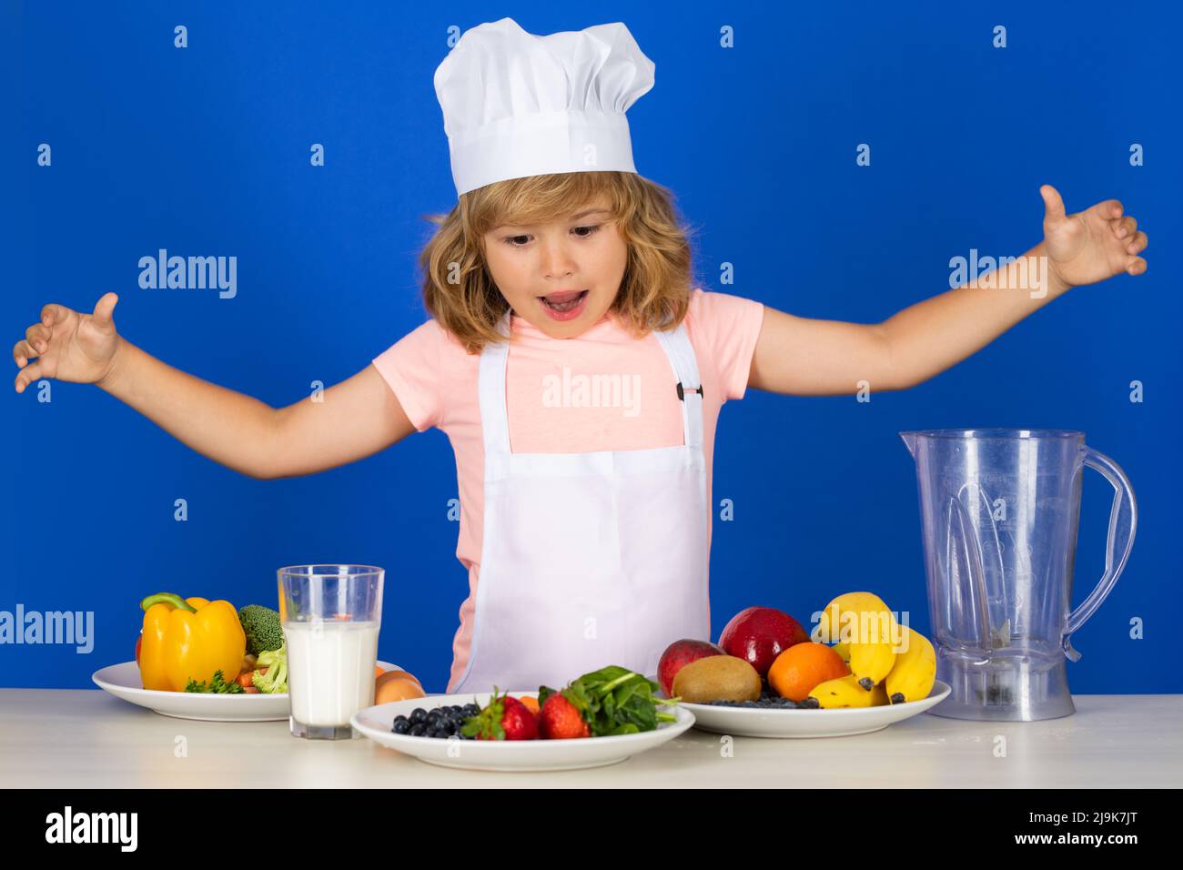 Excited funny chef cook. Fruits and vegetables for kids. Portrait of ...