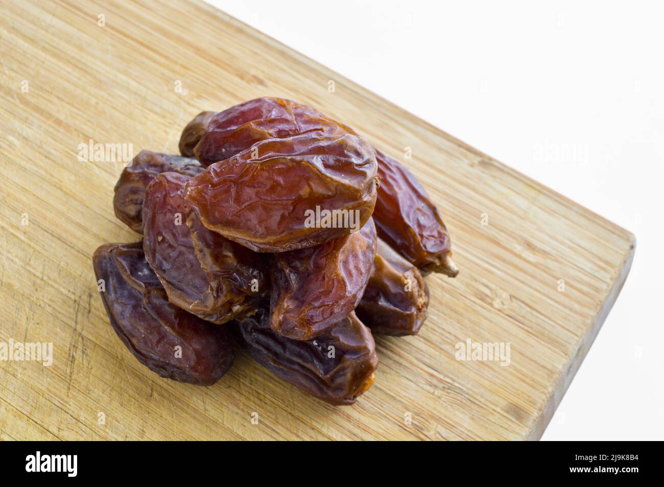 Organic fresh nutritious dried hurma dates medjool grains, on the ...