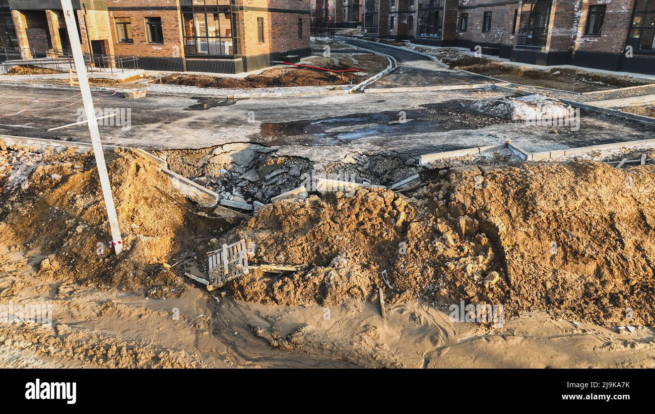 Asphalt destruction close-up. Pothole and pit on road Stock Photo - Alamy