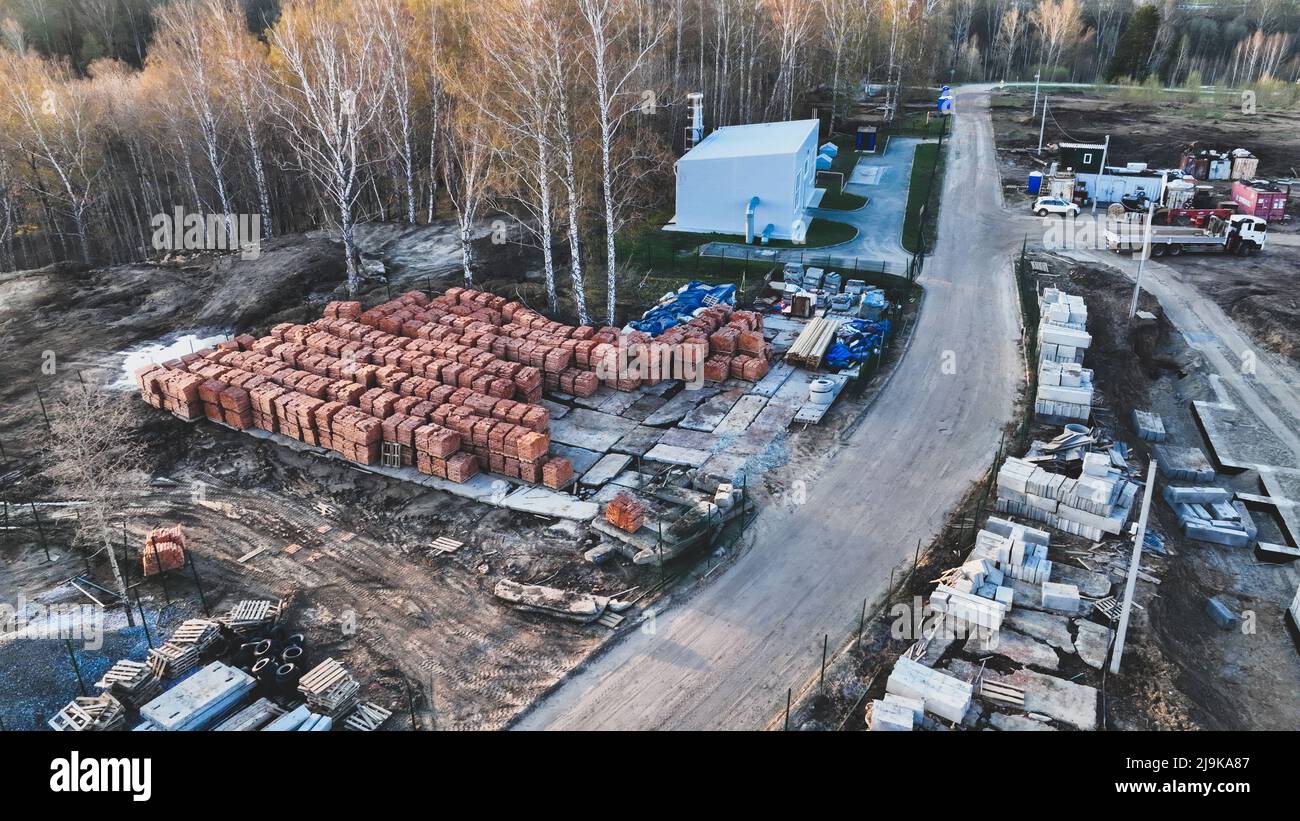 Pallets of bricks for construction. Outdoor storage. Warehousing of ...