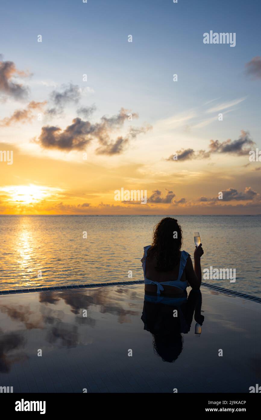Silhouette woman on infinity swimming hi-res stock photography and ...
