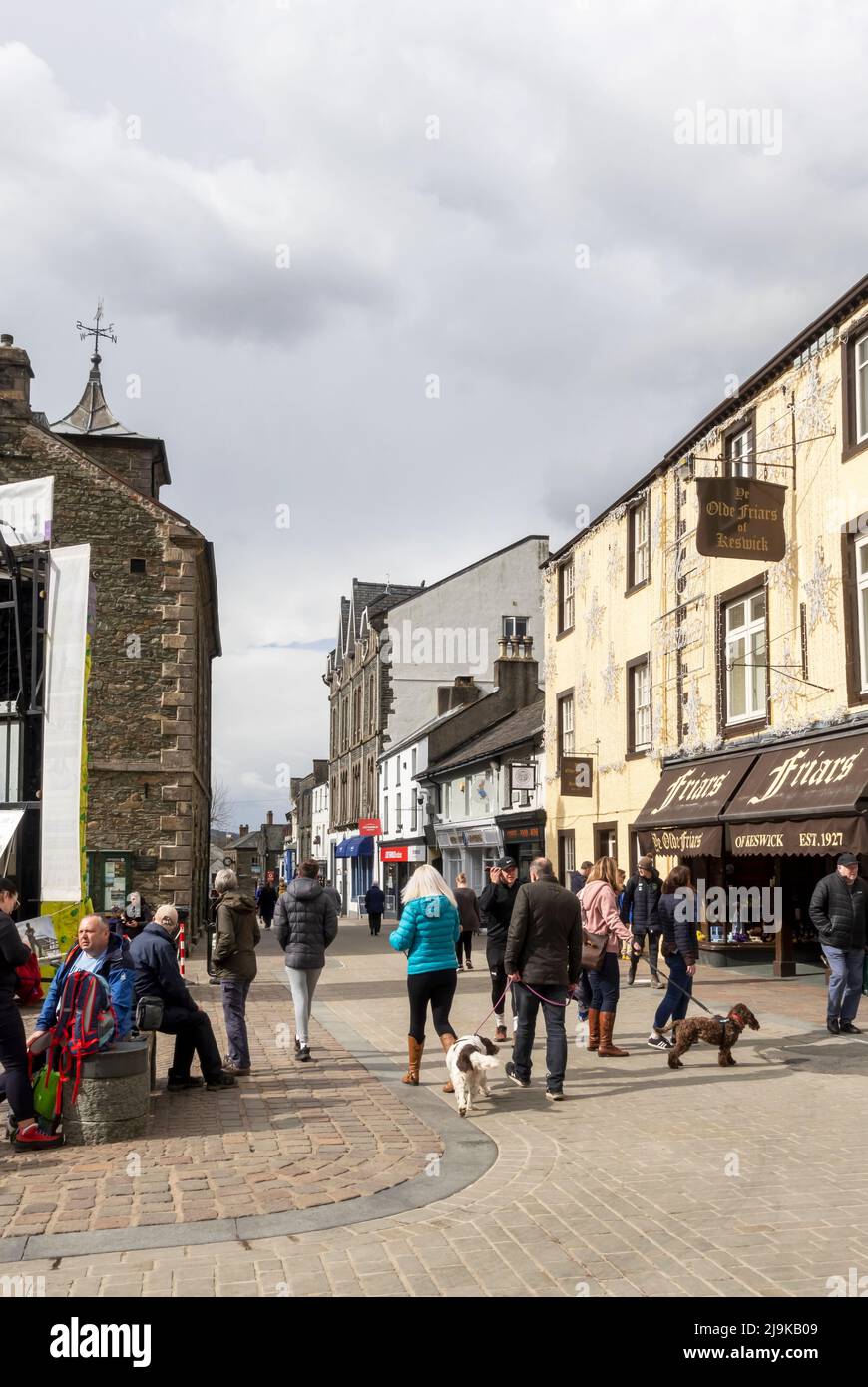 People tourists visitors walkers in the town centre street shops in ...