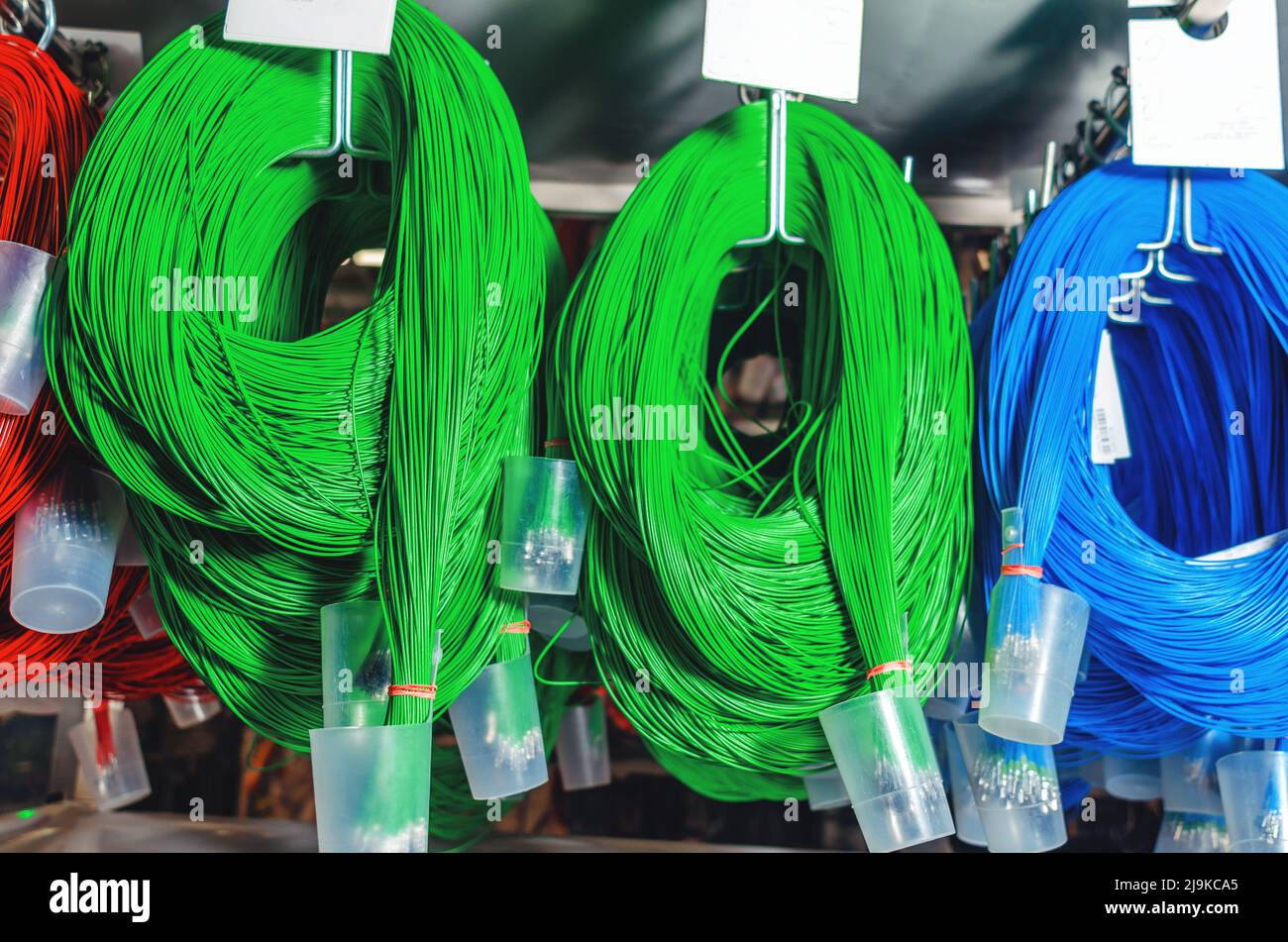 Blue and green bright wires. Skeins of colored cables for car ...