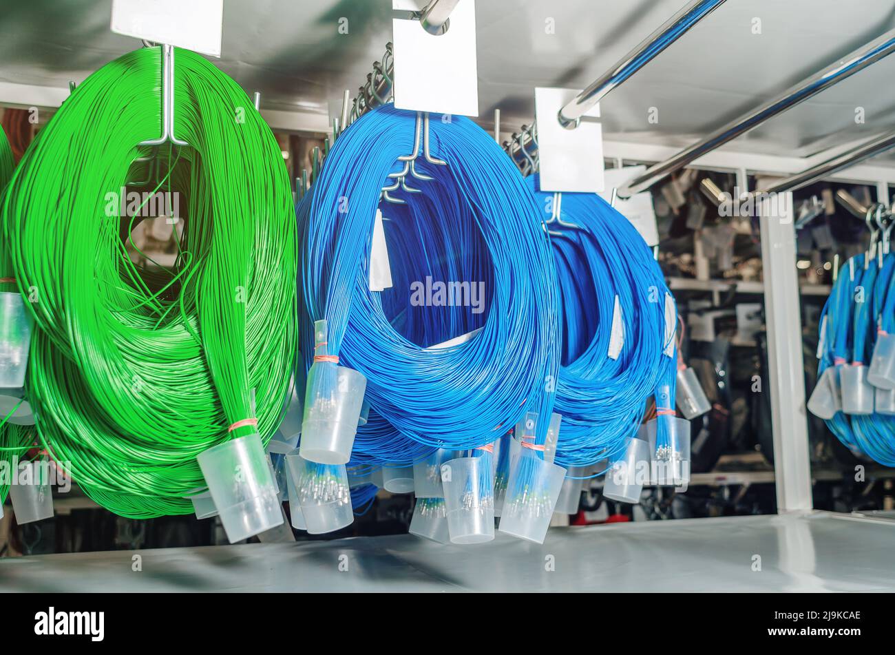 Blue and green bright wires. Skeins of colored cables for car ...