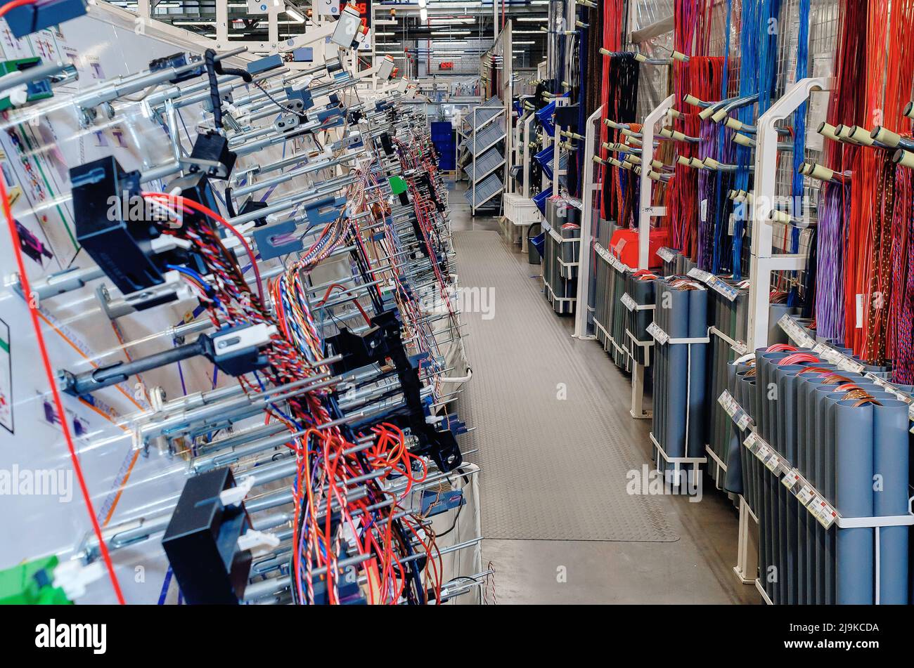 Production room with stands for manufacture of wiring for cars in ...