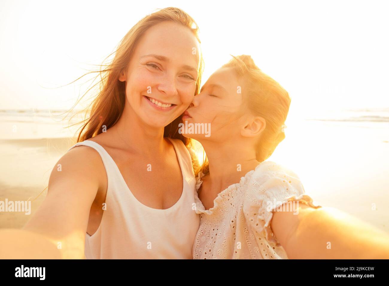 Mother kiss hi-res stock photography and images - Alamy
